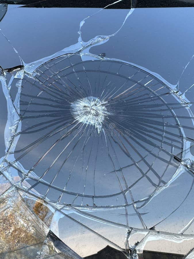 Broken Glass Close-up. Window with Cracked Glass. Bullet Hole in Double ...