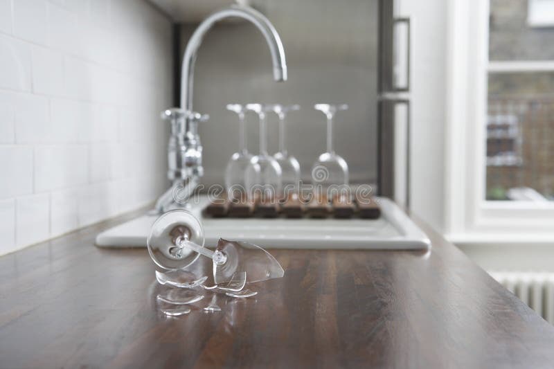 Broken Glass on Kitchen Floor Stock Image - Image of house, washbasin ...