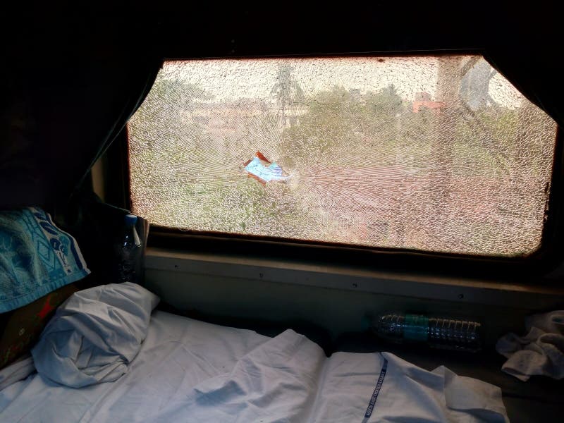 Broken glass in my train editorial stock image. Image of home - 122136404