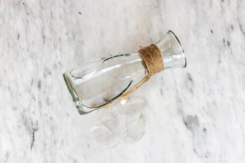 Broken Glass Vase Shattered on a Marble Floor Stock Image - Image of ...