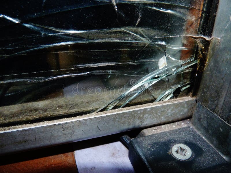 Broken Glass in Window in a Post Office Stock Photo - Image of criminal ...