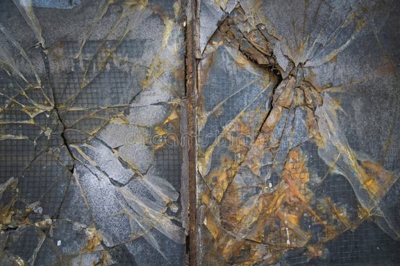 Broken Glass Window with Rusted Metal Grate Stock Photo - Image of ...
