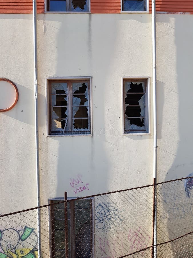 Broken Glass in the Windows of an Abandoned Building Stock Illustration ...