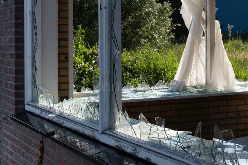 Broken Glass Windows, Caused by Vandalism or Demolition Stock Photo ...