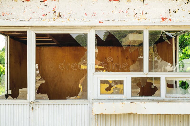 Broken Glass Windows on Old Abandoned Urban Kiosk Stock Photo - Image ...