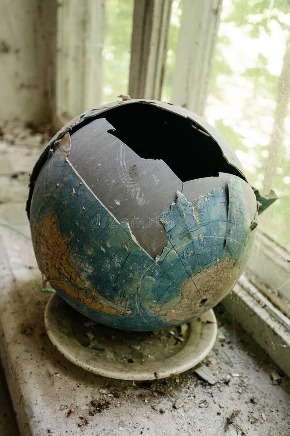 A Broken Globe on a Window in an Abandoned and Destroyed School. Stock ...