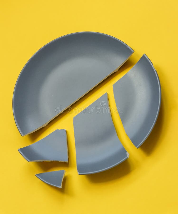 Broken Gray Ceramic Plate on Yellow Background Stock Photo - Image of ...