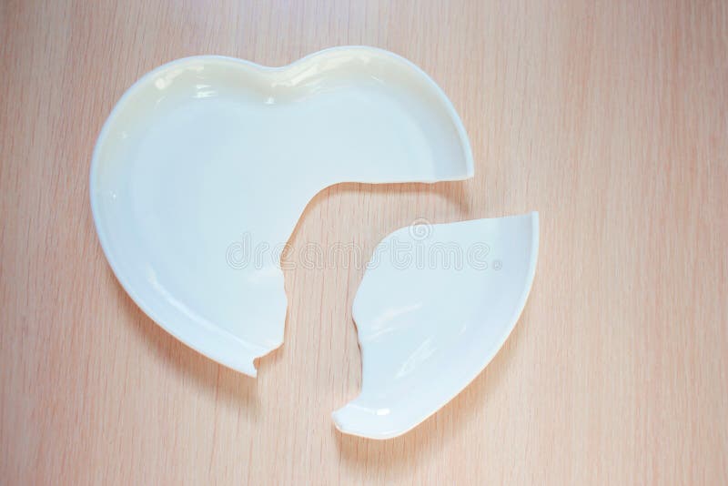 Shards of a Broken Plate on a Blue Background. Small Pieces of Chopped ...