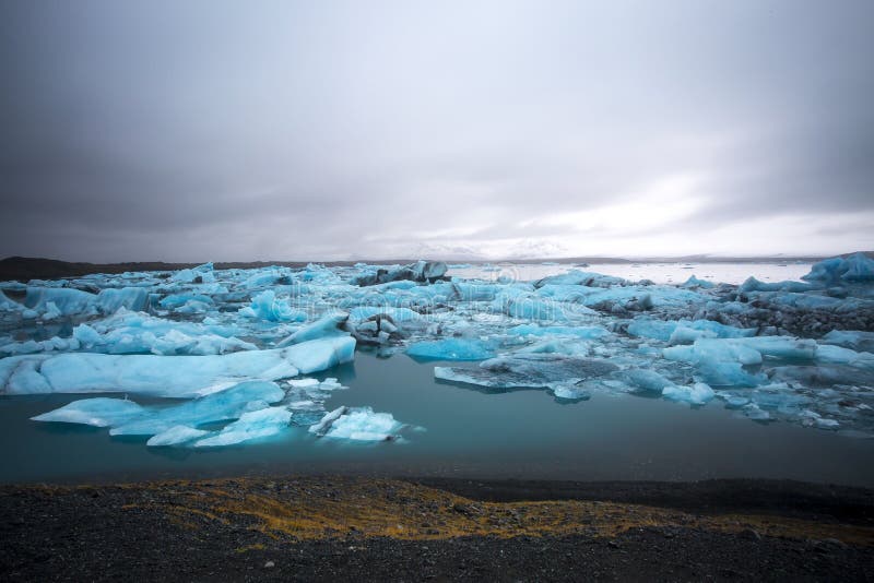 Broken Ice Blocks in Iceland Stock Photo - Image of fountain, geyser ...