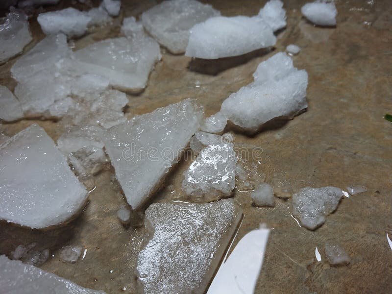 Broken ice on the floor stock photo. Image of dessert - 263879634