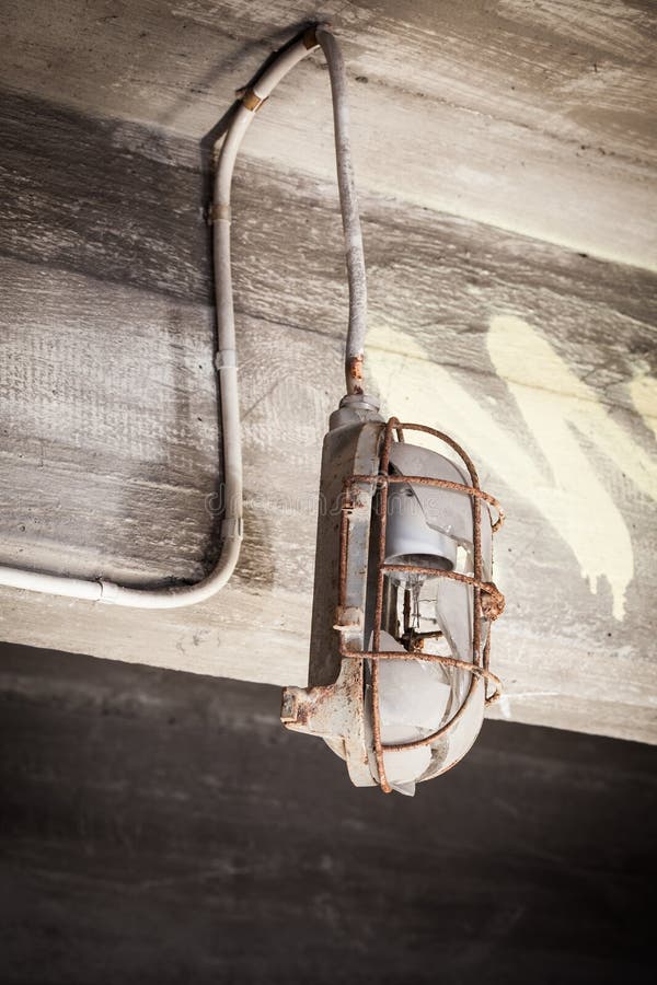 Old Broken Industrial Spotlight with No Lightbulb Installed on the ...