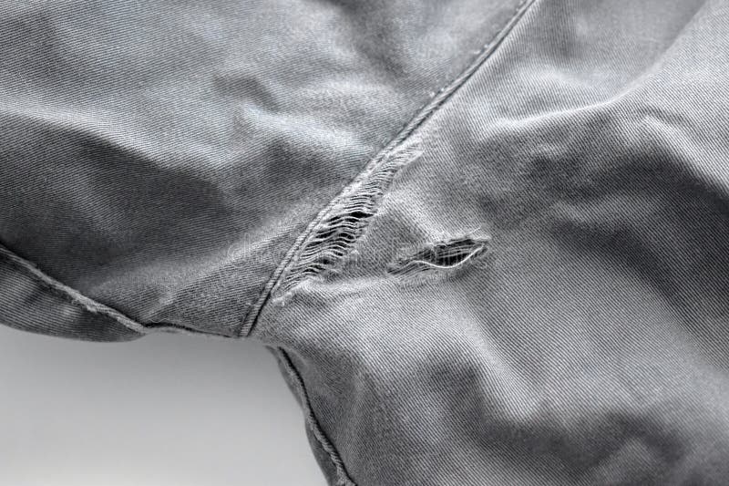 Broken Jeans on the Back Cracked with Hole at the Crotch. Stock Image ...