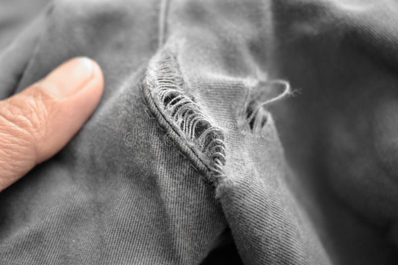 Broken Jeans on the Back Cracked with Hole at the Crotch. Stock Image ...