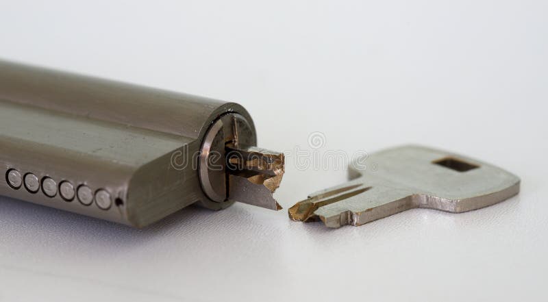 Broken key in the lock stock photo. Image of keyhole - 336362332