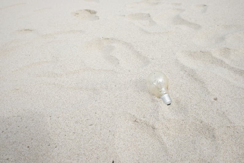 Lamp on the sand stock photo. Image of idea, broken, footsteps - 99052174