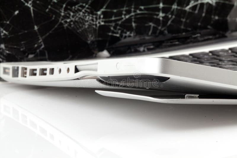 Broken Laptop Computer Spoiled By Flame Melted Plastic. Computer Damage ...