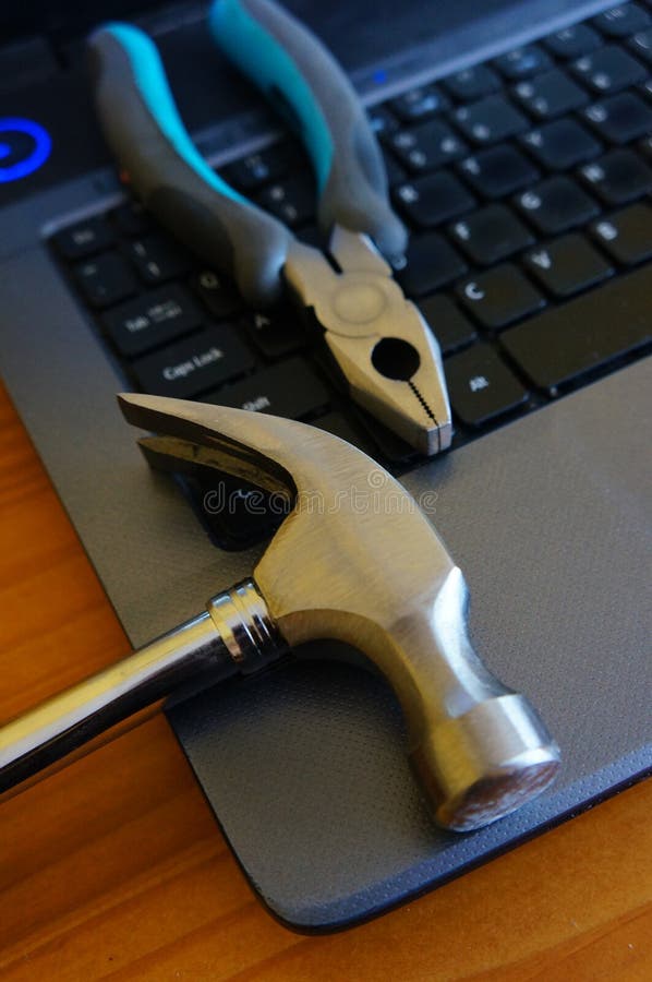 Broken laptop stock image. Image of tools, keyboard, pliers - 24552189