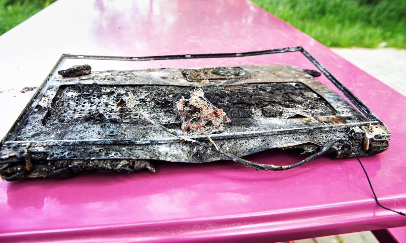 Destroyed Notebook, Melted Plastic. Computer Damage Stock Image - Image ...