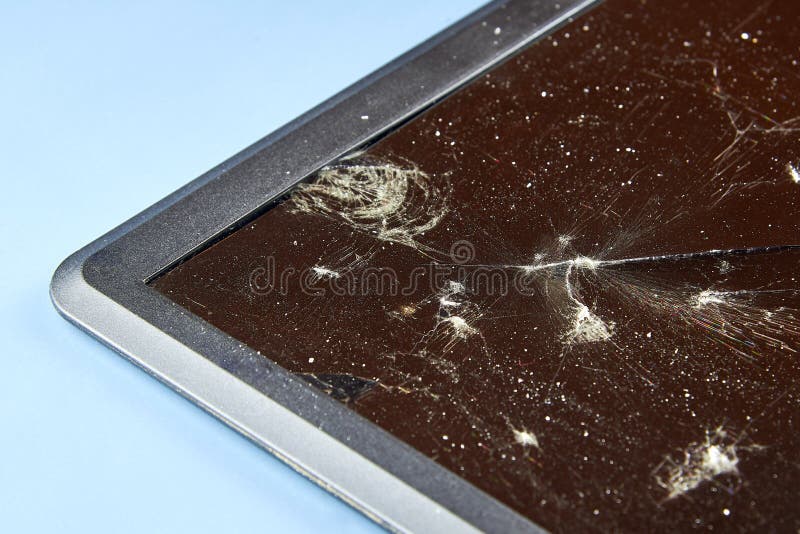 Broken Laptop Screen on a Blue Background Stock Photo - Image of glass ...