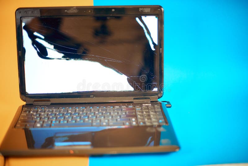 A Broken Laptop Screen on a Colorful Background Stock Image - Image of ...