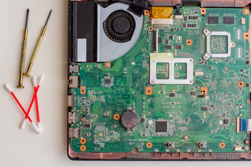 Broken Laptop on White Table. Tools for Repair Laptops Stock Image ...