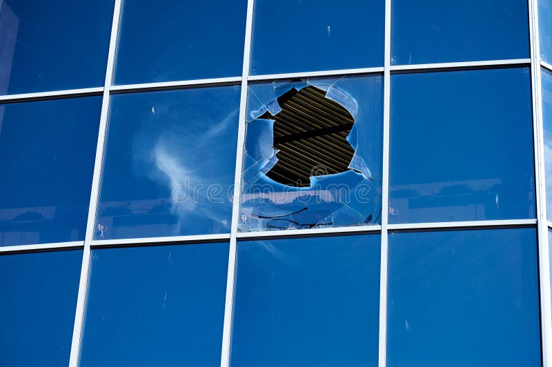 Broken Blue Window in a High-rise Building Stock Photo - Image of ...