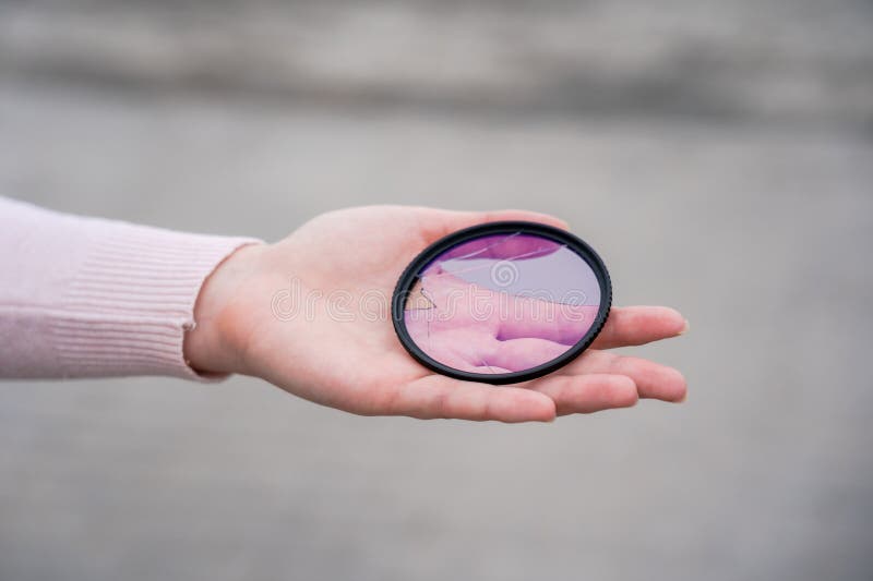 Broken Lens Filter in Hand. Cracked Photo-filter Stock Image - Image of ...