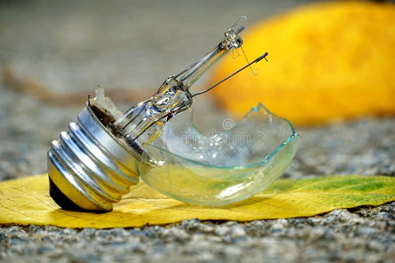 Broken Light Bulb on the Ground Stock Photo - Image of environment ...