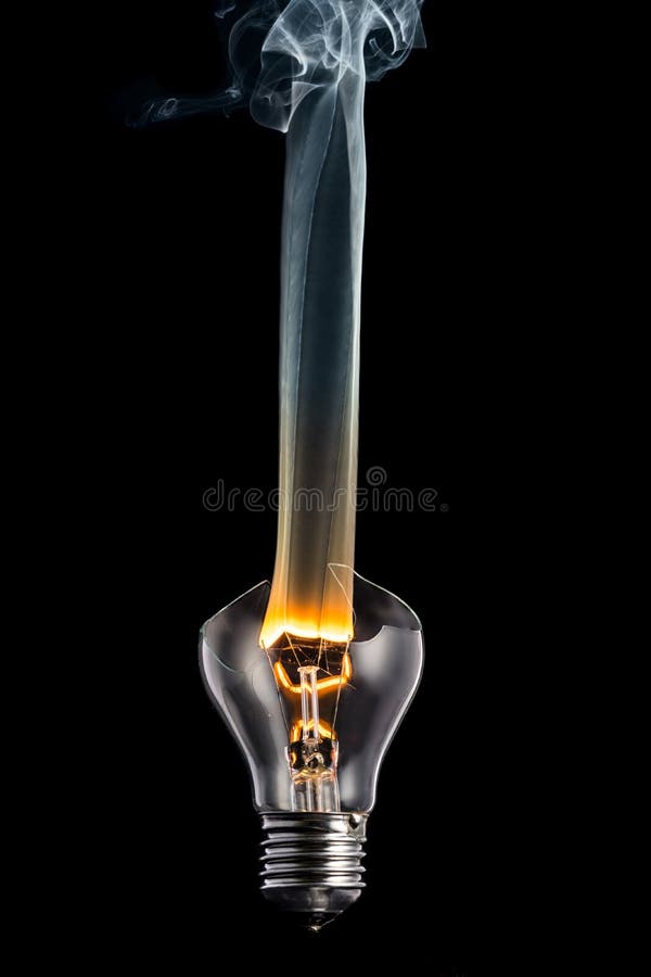 Broken Light Bulb and Smoke from a Burning Spiral on a Black Background ...