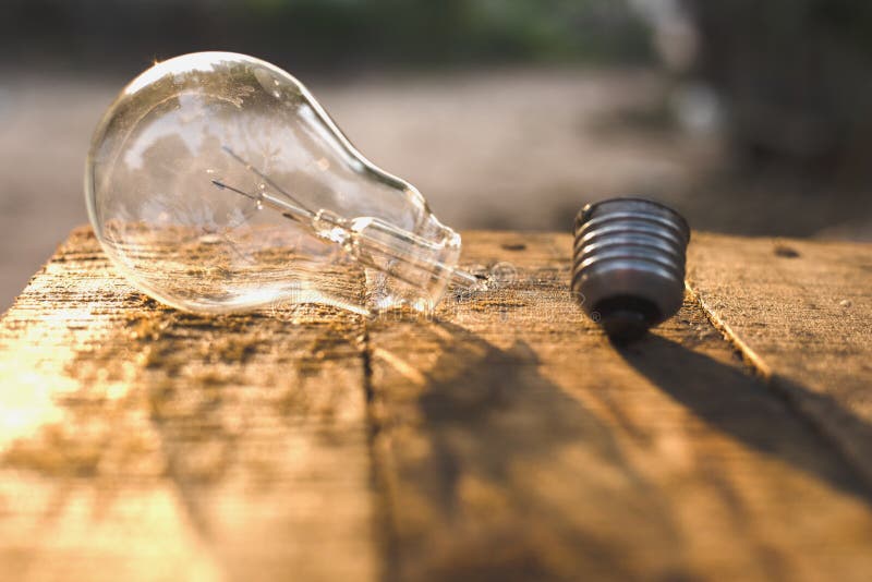 Broken Light Bulb on the Table, the Concept of Failure Stock Photo ...