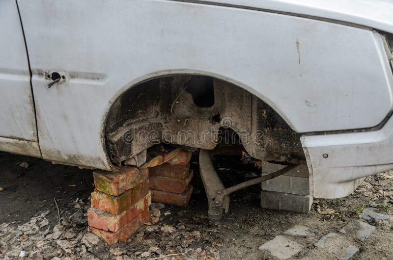 Broken Machine without a Wheel is on the Bricks Stock Image - Image of ...