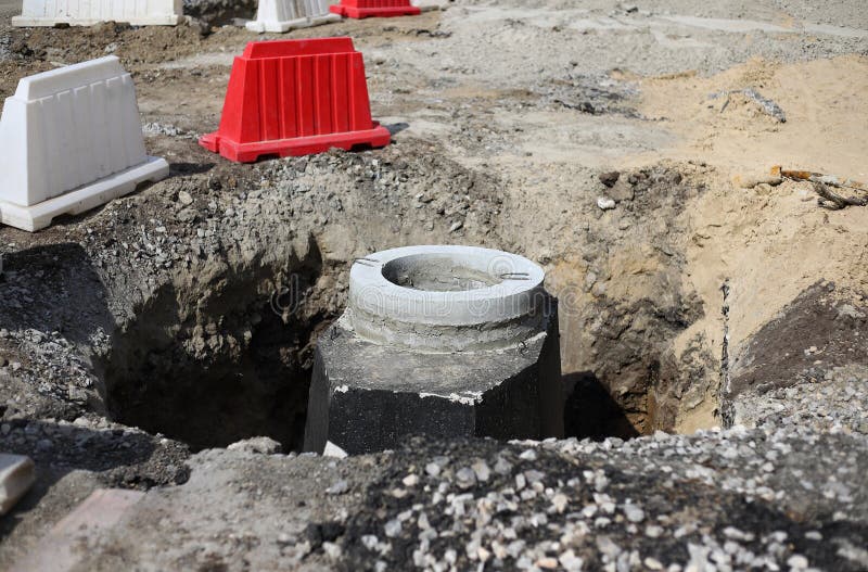 Broken Mangled Road and Sewer Hatch, Fencing and Hazard Warning Signs ...