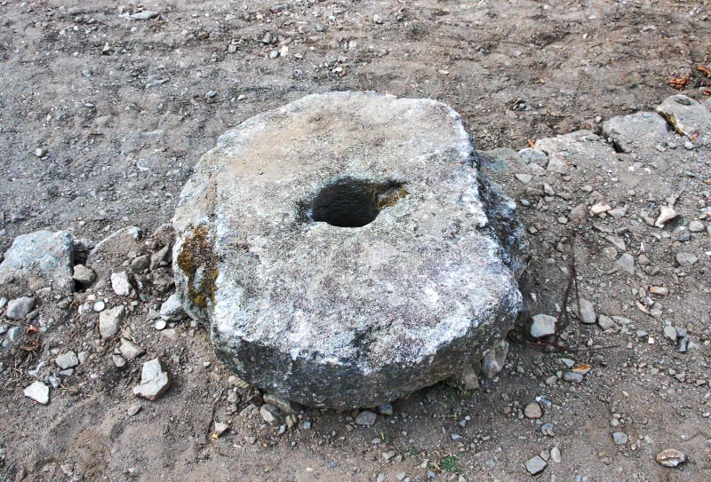A broken millstone stock photo. Image of stones, corn - 75868246
