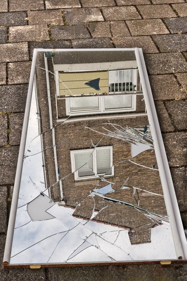 Broken Mirror Lying Shattered on the Ground Stock Image - Image of ...