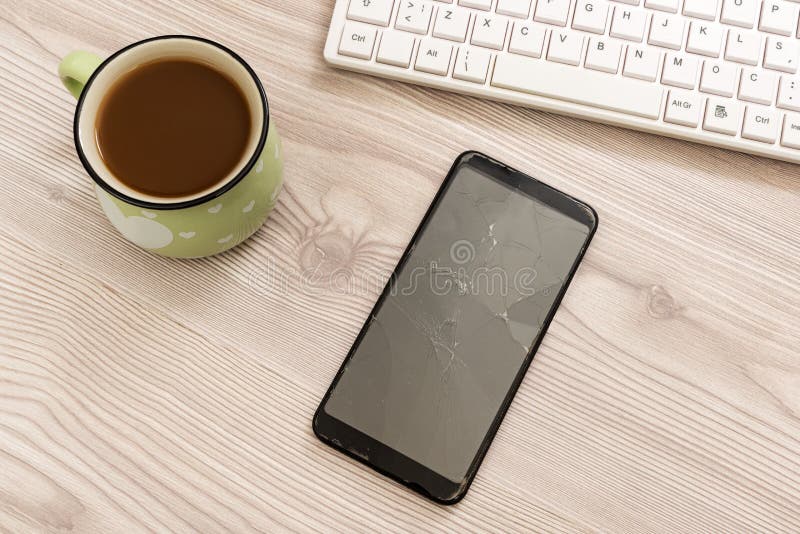 Broken Mobile Phone Screen with Computer Keyboard Stock Image - Image ...