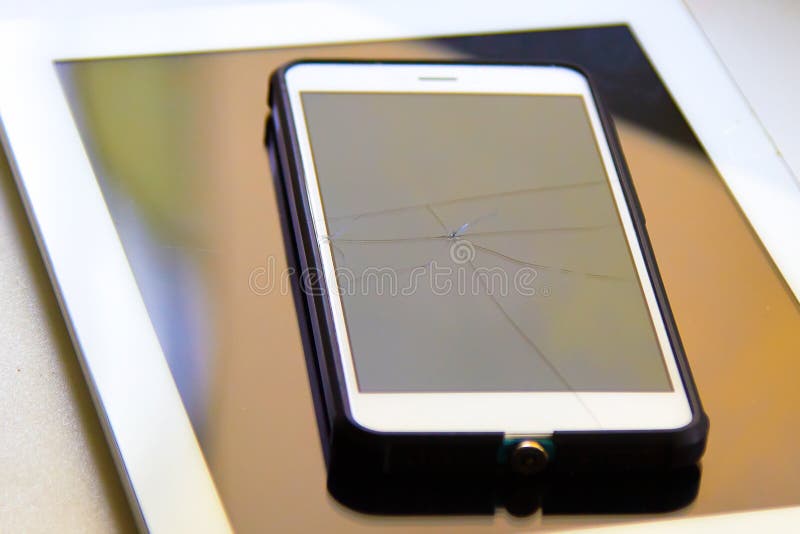 Colored Highlights of a Broken Mobile Phone Screen in the Reflection of ...