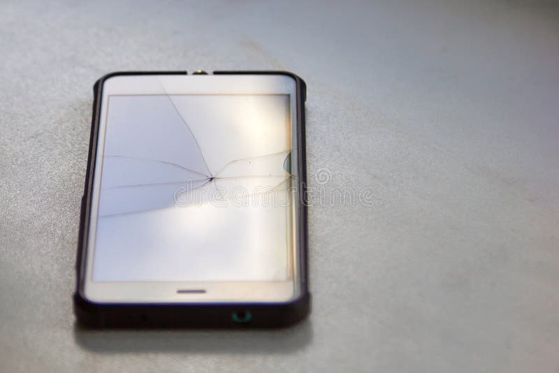 Colored Highlights of a Broken Mobile Phone Screen in the Reflection of ...