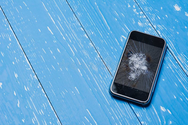 Broken Mobile Phone on Vintage Painted Table Close Up Stock Image ...