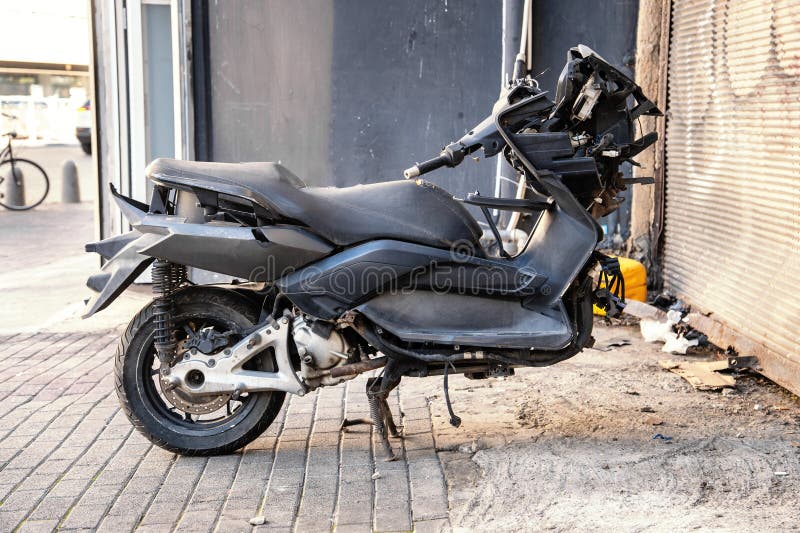 Broken Motorcycle without a Front Wheel on the Street Stock Photo ...