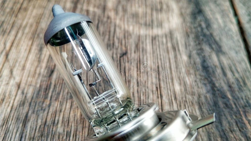 A Broken Motorcycle Headlight Bulb Shows a Broken and Blackened ...