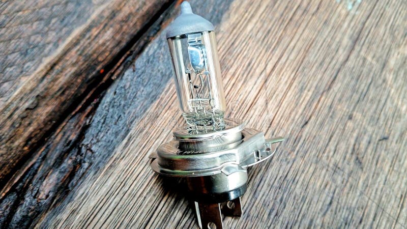 A Broken Motorcycle Headlight Bulb Shows a Broken and Blackened ...