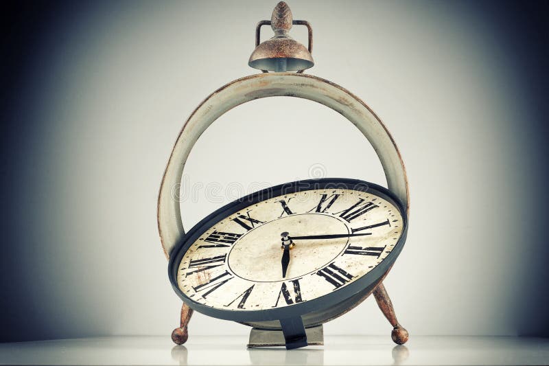 Broken Old Analog Clock with Glass and Metal Frame on Wooden Table ...