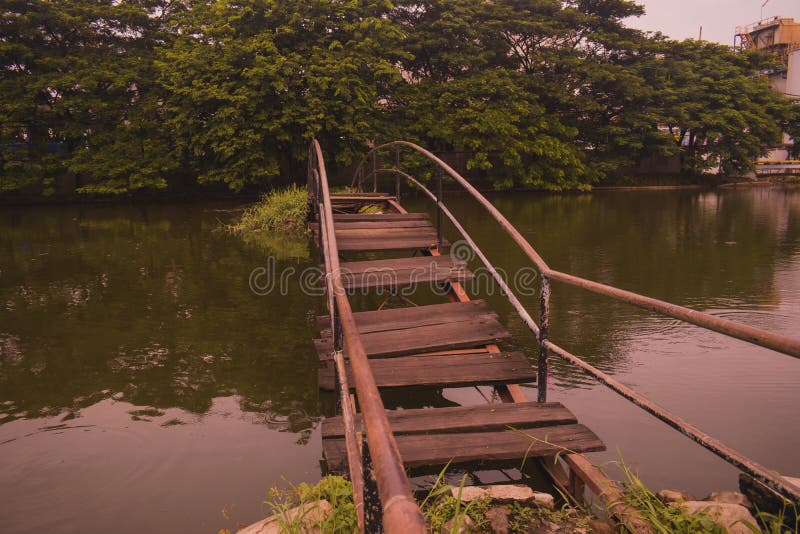 Old Wooden Bridge Across the River Stock Image - Image of broken ...