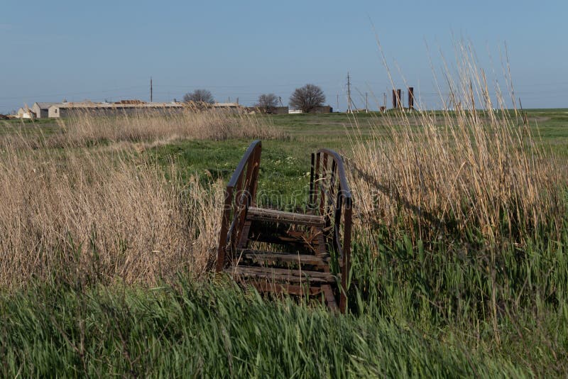 Broken Old Foot Bridge Over the River in the Fields Stock Image - Image ...