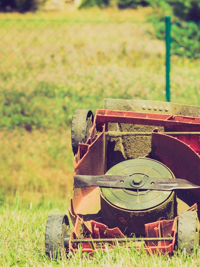 Broken Old Lawnmower in Backyard Grass Stock Image - Image of equipment ...