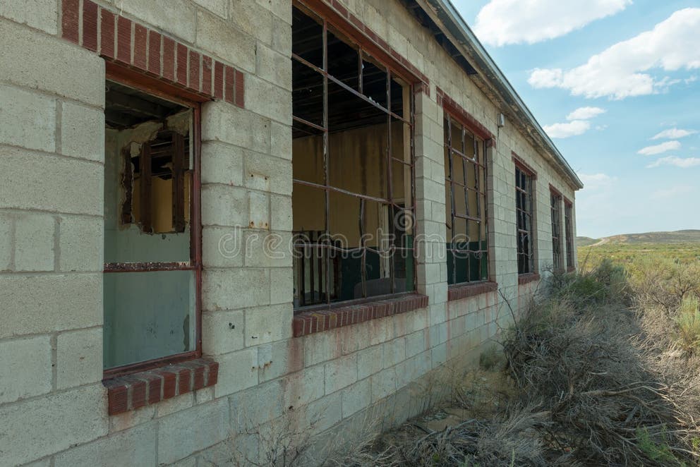 Broken Out Windows on the Side of an Abandoned Building Stock Photo ...
