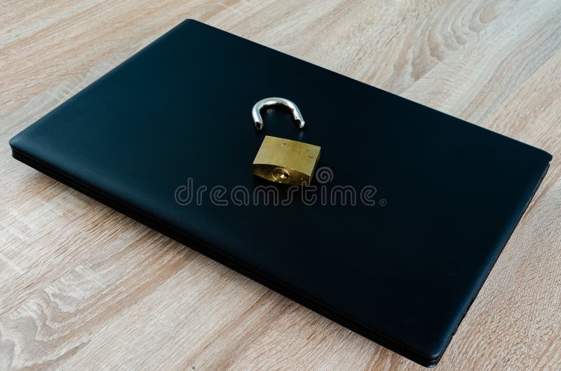 Broken Padlock on Closed Laptop Computer, Concept for Internet and ...