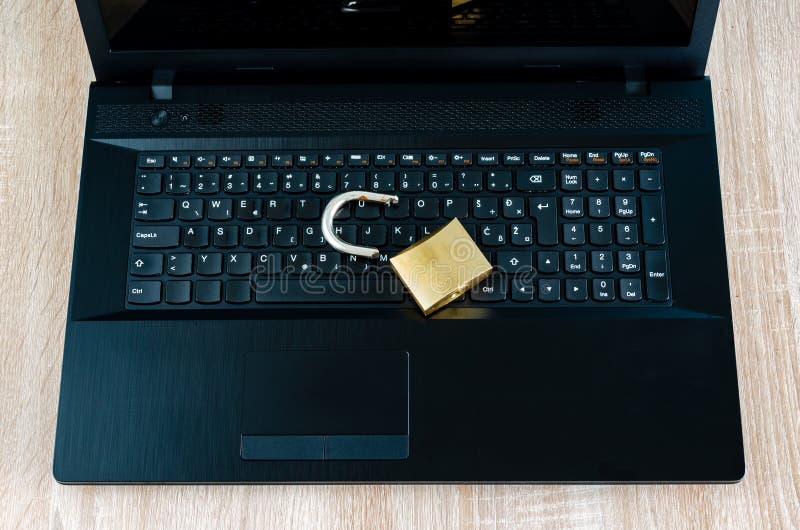 Broken Padlock on Open Laptop Computer. Internet and Technology ...