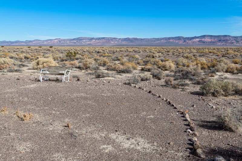 A Broken Park Bench in the Middle of the Desert Stock Photo - Image of ...