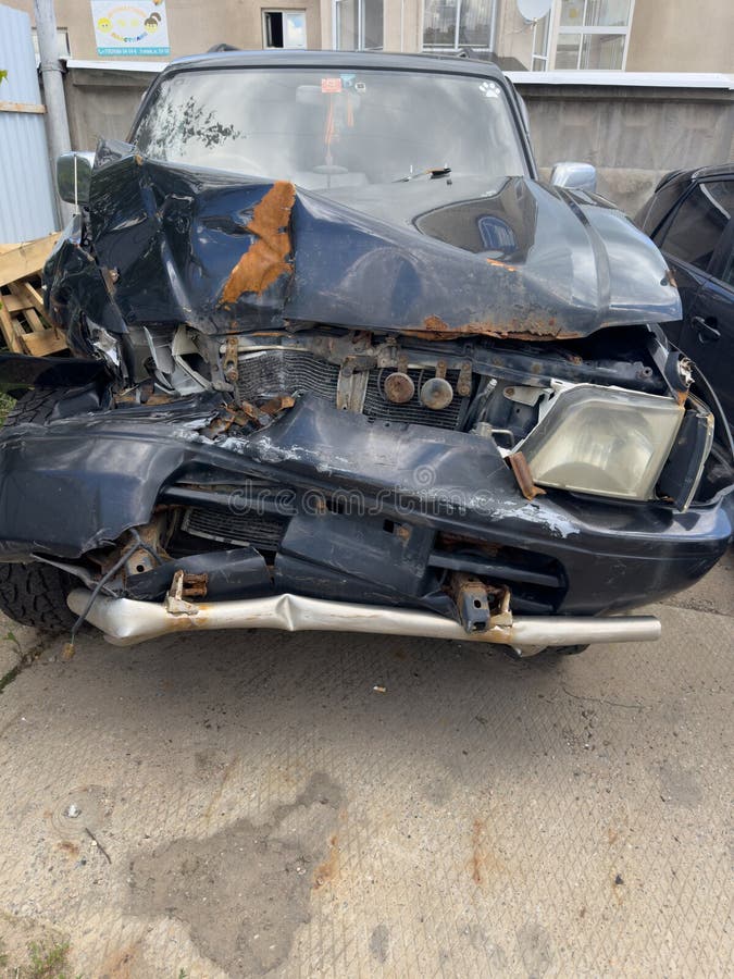 A Broken Passenger Car with Rust, Close-up, Standing Outside Stock ...